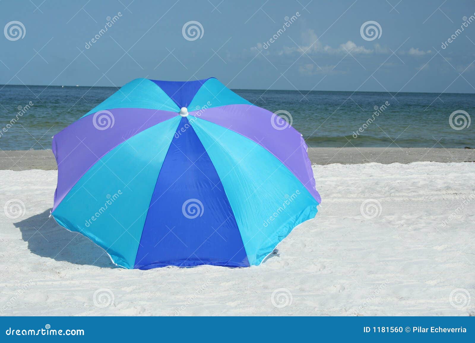 Blue parasol stock photo. Image of sand, vacation, summertime - 1181560