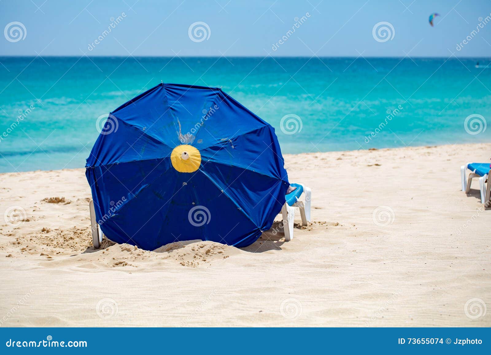 Blue Parasol on Sandy Beach Stock Photo - Image of hotel, beach: 73655074