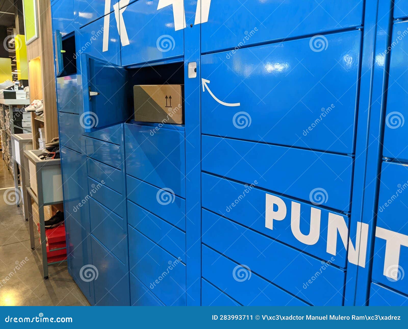 Blue Parcel Collection Lockers in a Store Editorial Photo - Image of ...