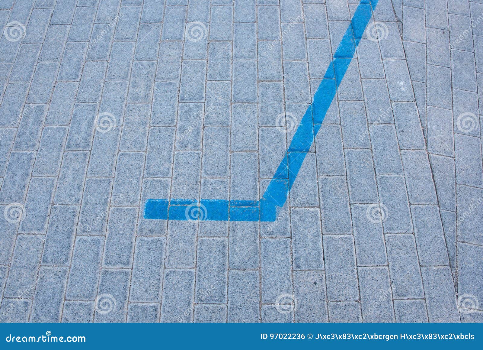 Blue Parking Mark on Gray Paving Stones with Joints Stock Photo - Image ...