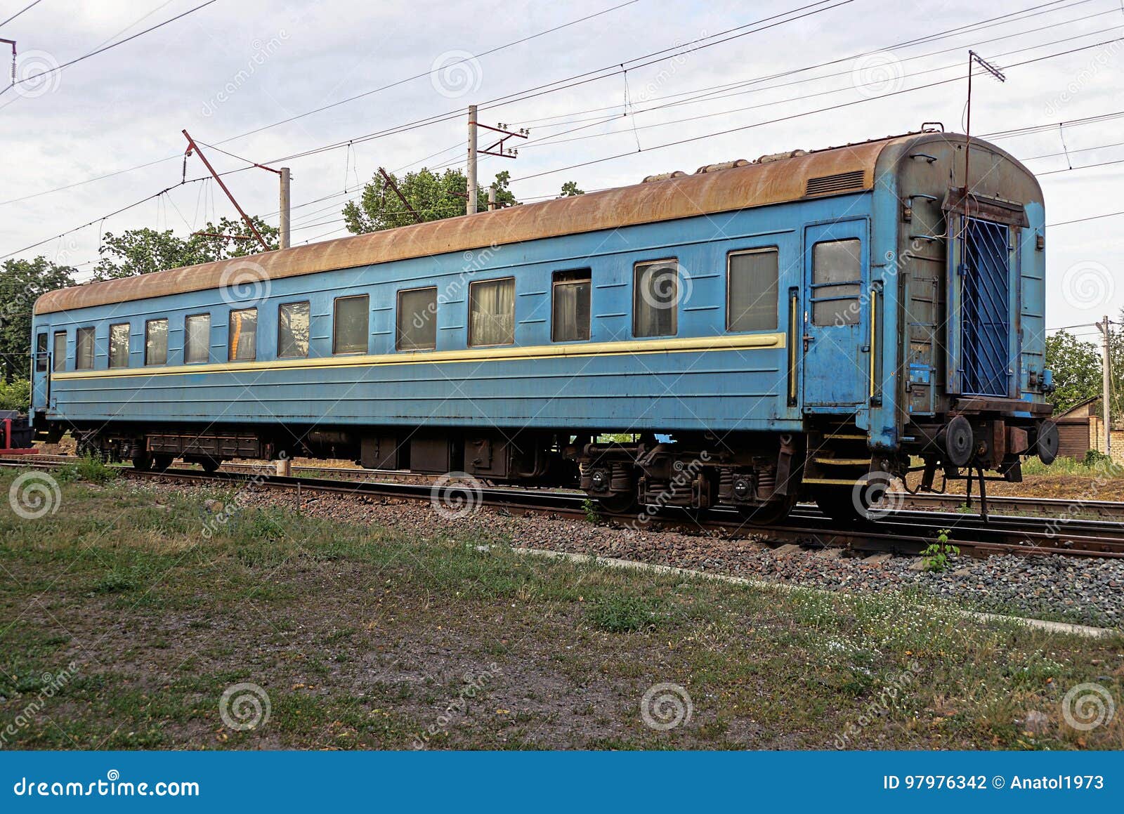 Blue Passenger Car on Rails on the Railway Stock Photo - Image of ...