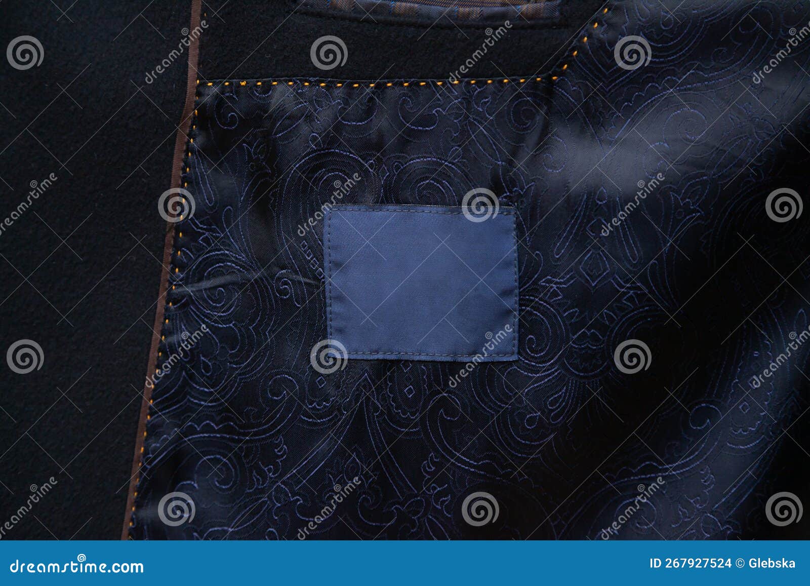 Blue Patch on Patterned Lining Inside Coat Stock Photo - Image of ...