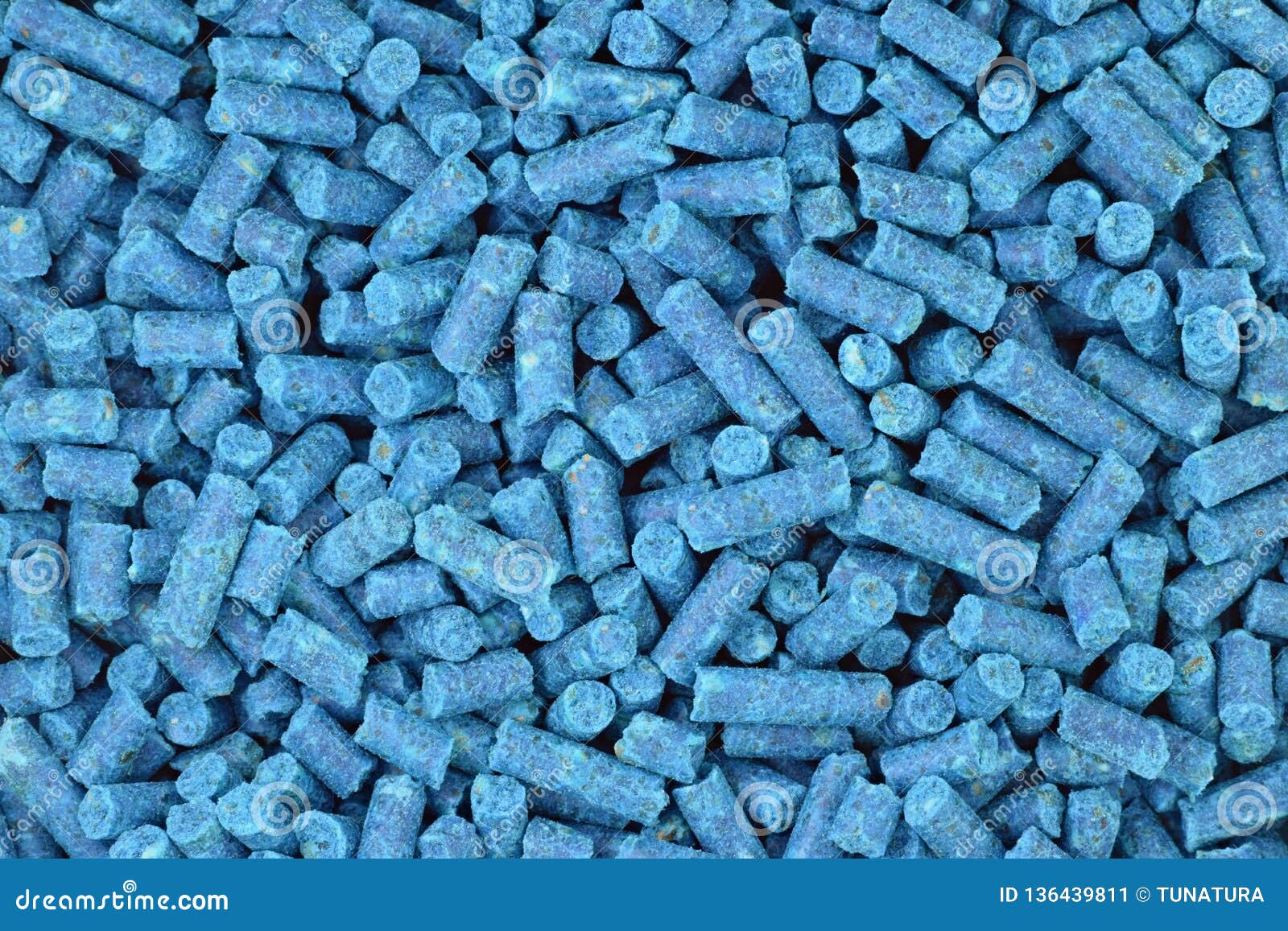 Blue pellets, background stock image. Image of granulate - 136439811