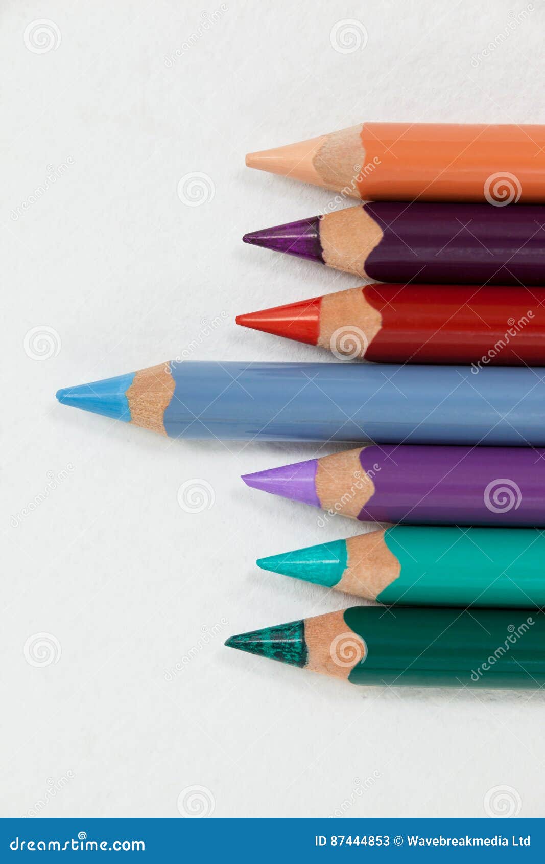 Blue Pencil Standing Out from a Row of Colored Pencils Stock Image ...
