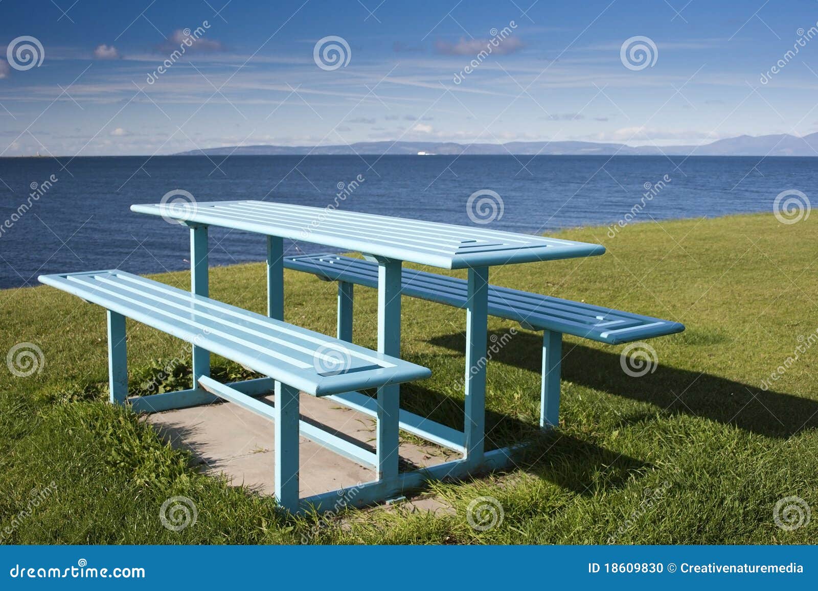 Blue Picnic Table by the Sea Stock Photo - Image of colourful, summer ...