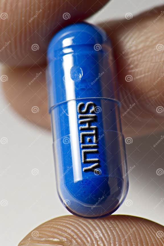 A blue pill with stock image. Image of finger, injection - 316022963