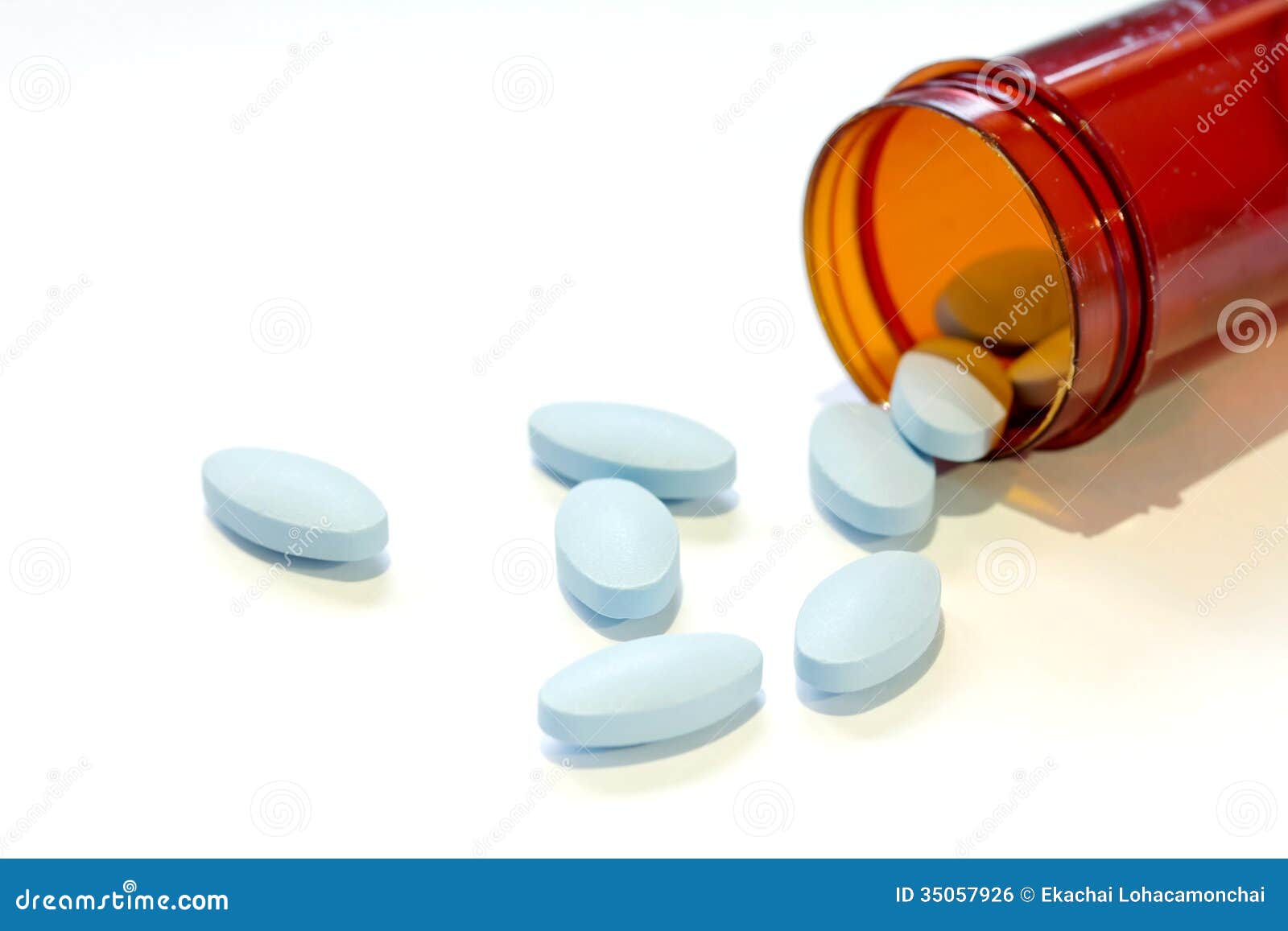 Blue pills an pill bottle stock photo. Image of healthcare - 35057926