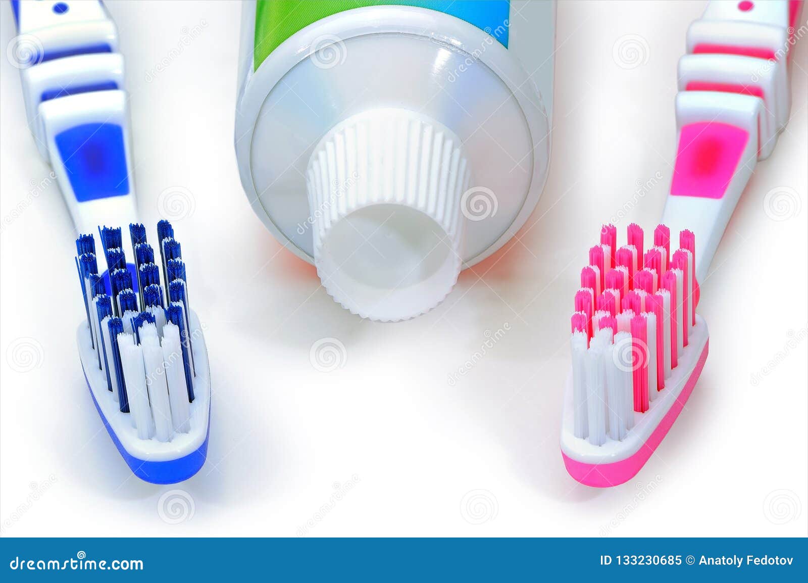 Blue, Pink Toothbrushes and Toothpaste are Isolated on a White Stock ...