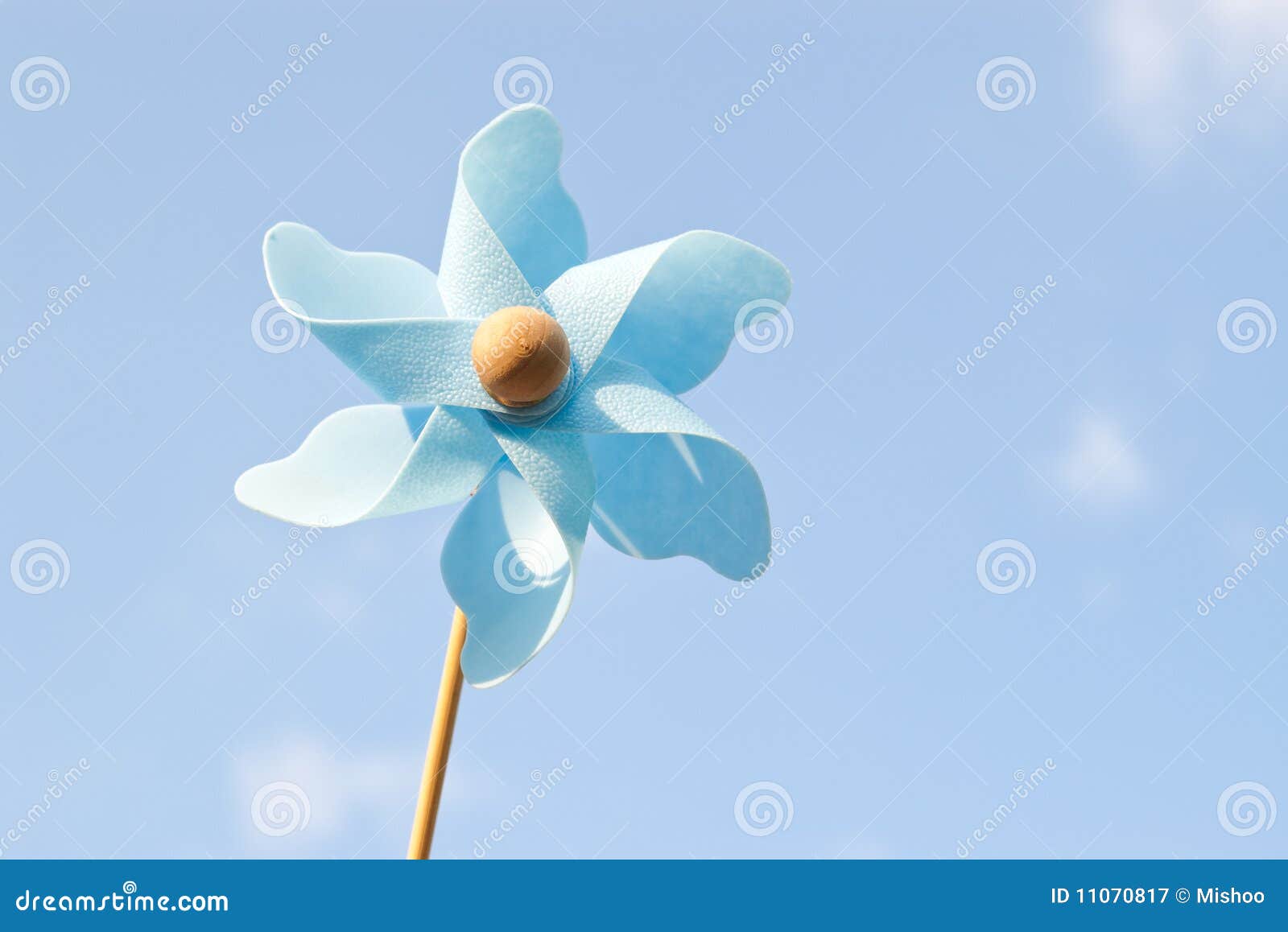 Blue pinwheel stock image. Image of clouds, energy, play - 11070817