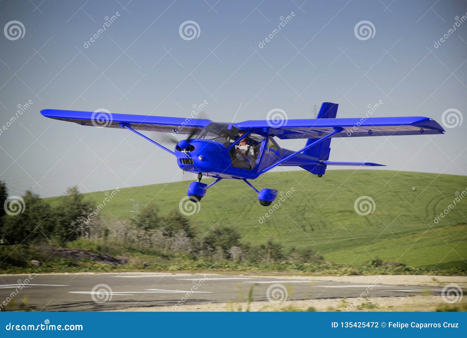 A Blue Plane Manned by Student and Flight Instructor of a Class Flight ...