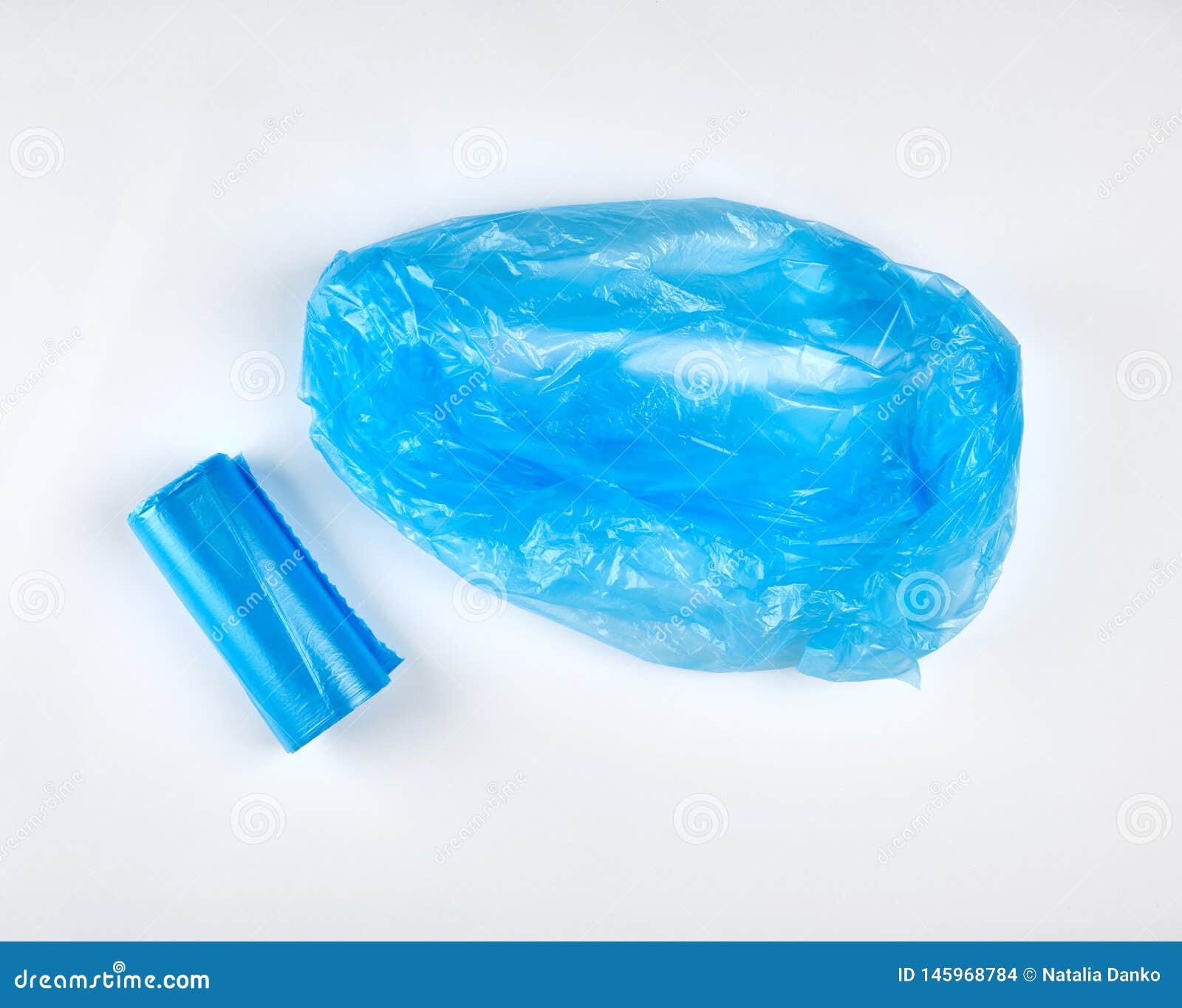 Blue Plastic Bag for Garbage on a White Background Stock Photo - Image ...