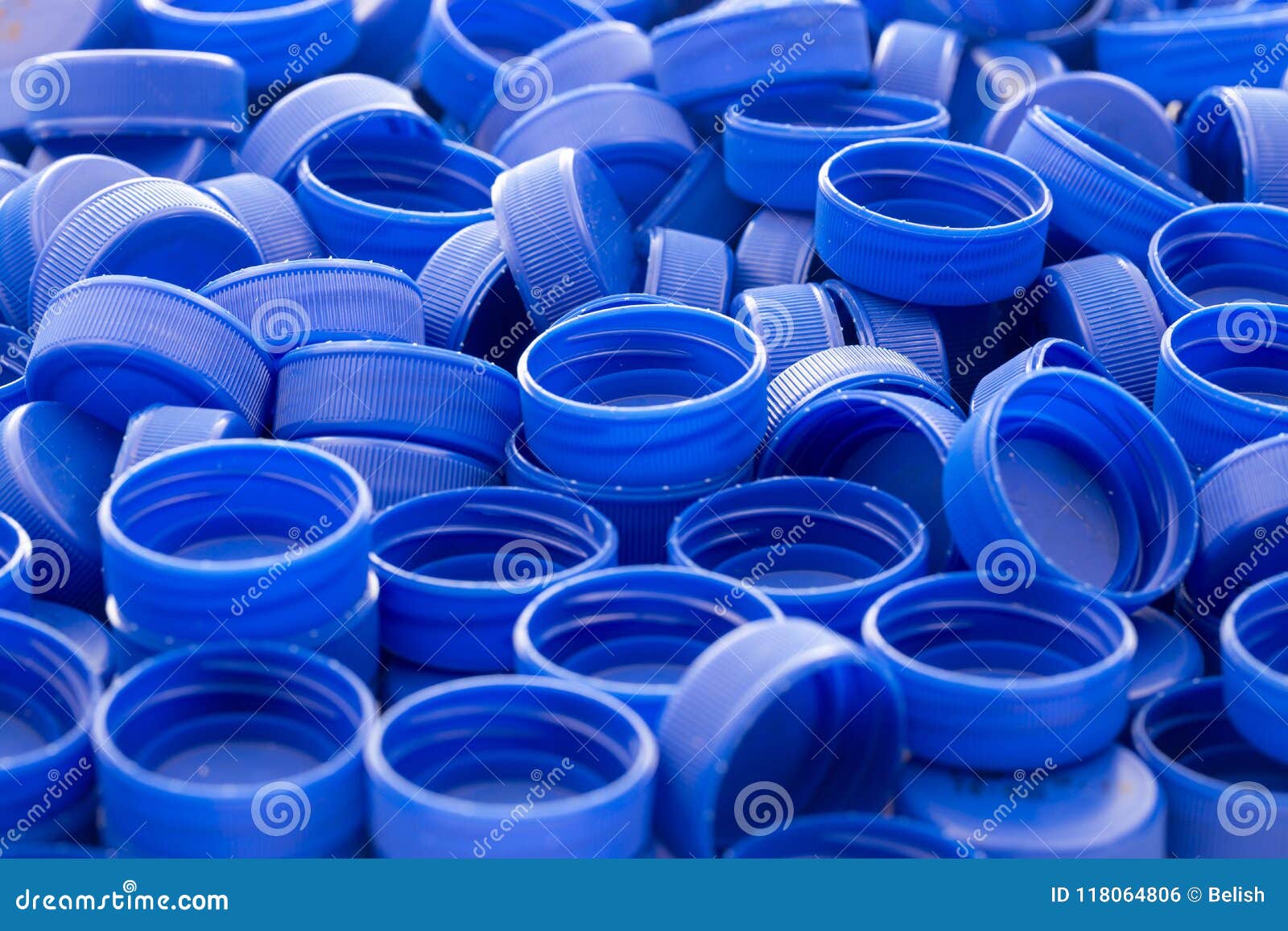 Blue plastic bottle caps stock photo. Image of industry - 118064806