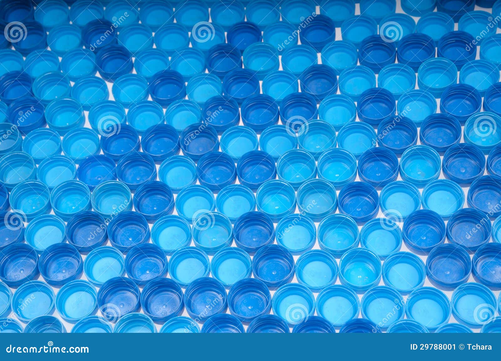 Blue plastic bottle caps stock image. Image of selective - 29788001
