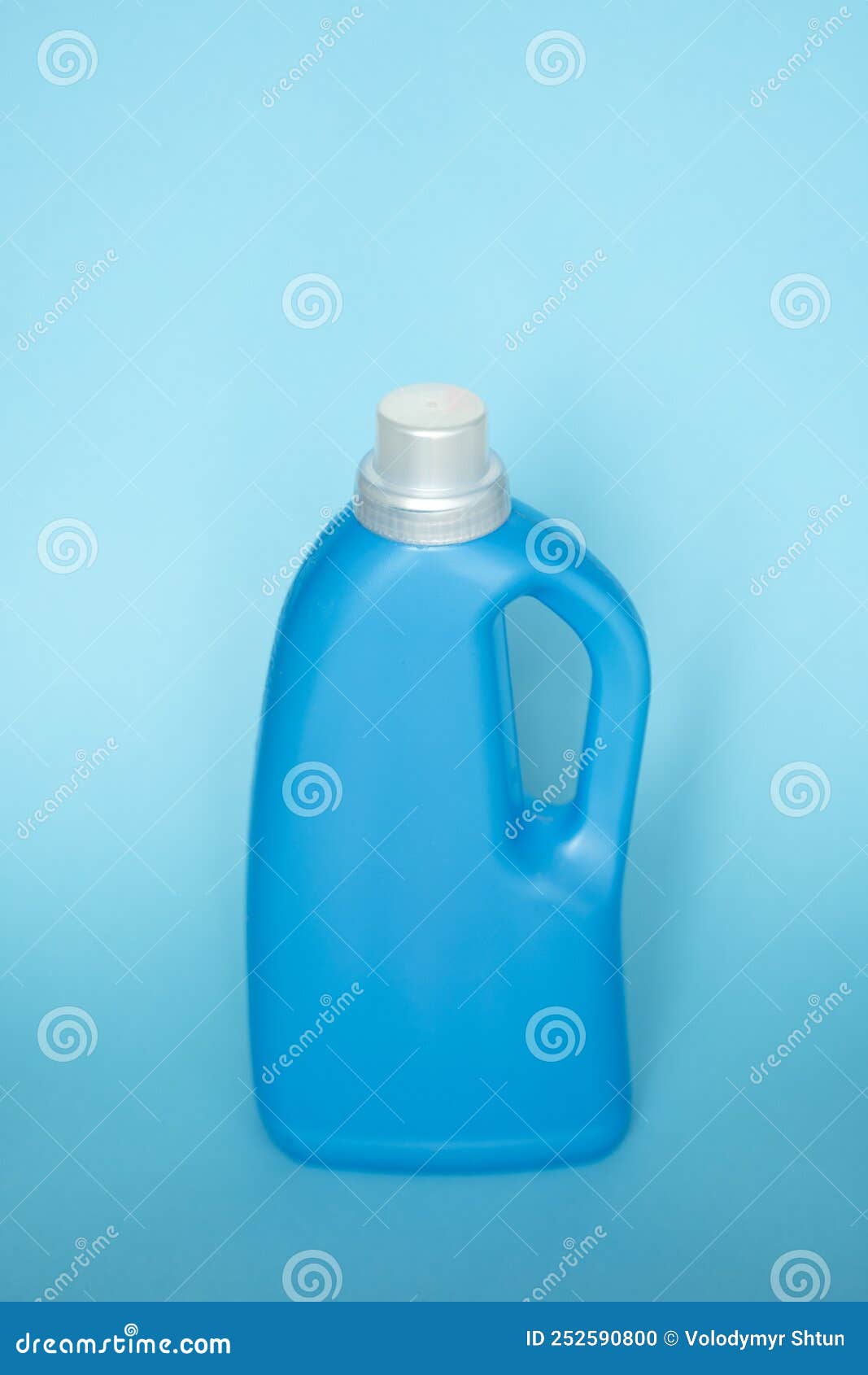 Blue Plastic Bottle with a Grey Cap Isolated on Blue Background for ...