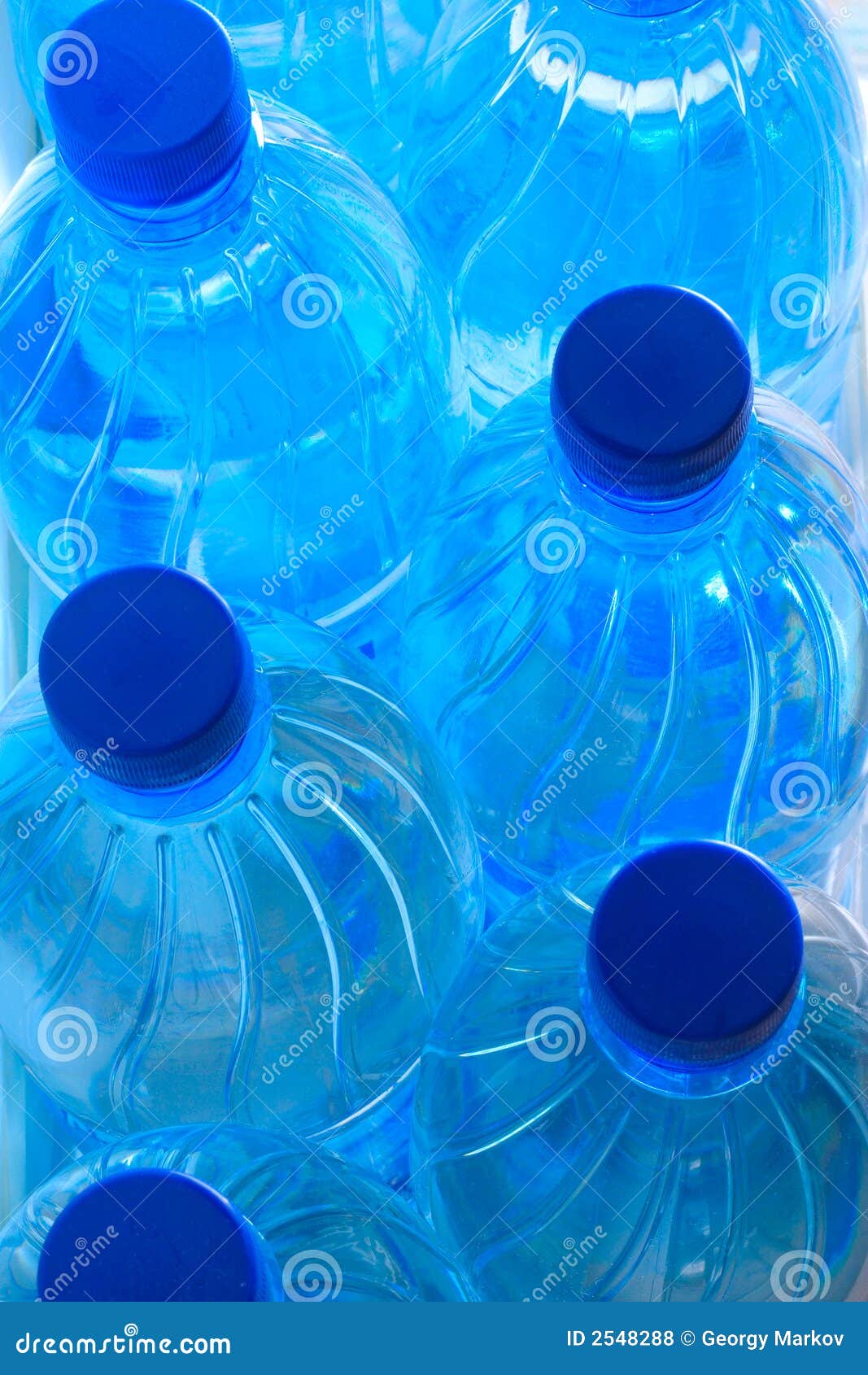 Blue plastic bottles stock photo. Image of plastic, thirst - 2548288