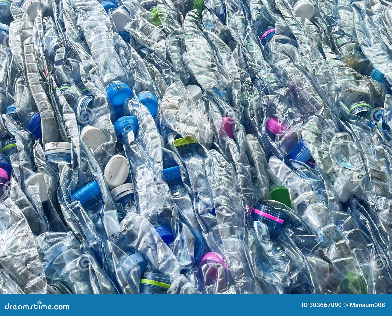 Blue Plastic Bottles with a Recycling Symbol Stock Photo - Image of ...