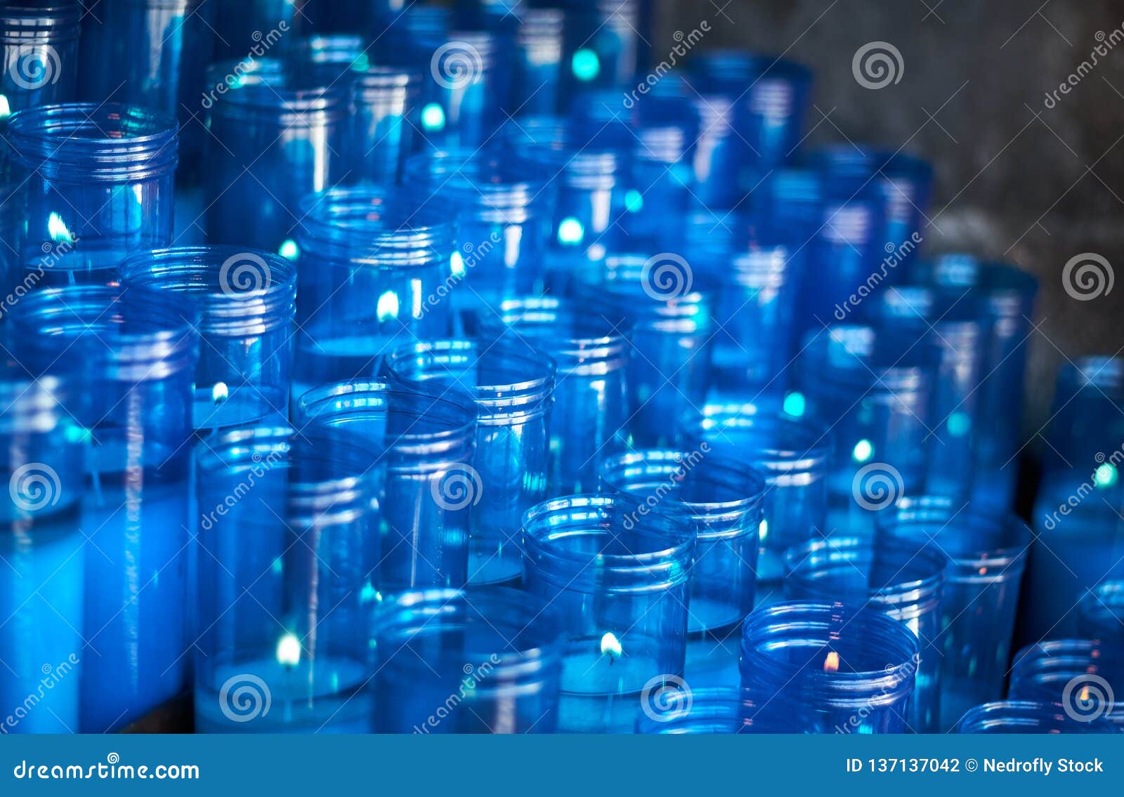 Blue Plastic Candles of a Sanctuary with Selective Focus and Copy Space ...