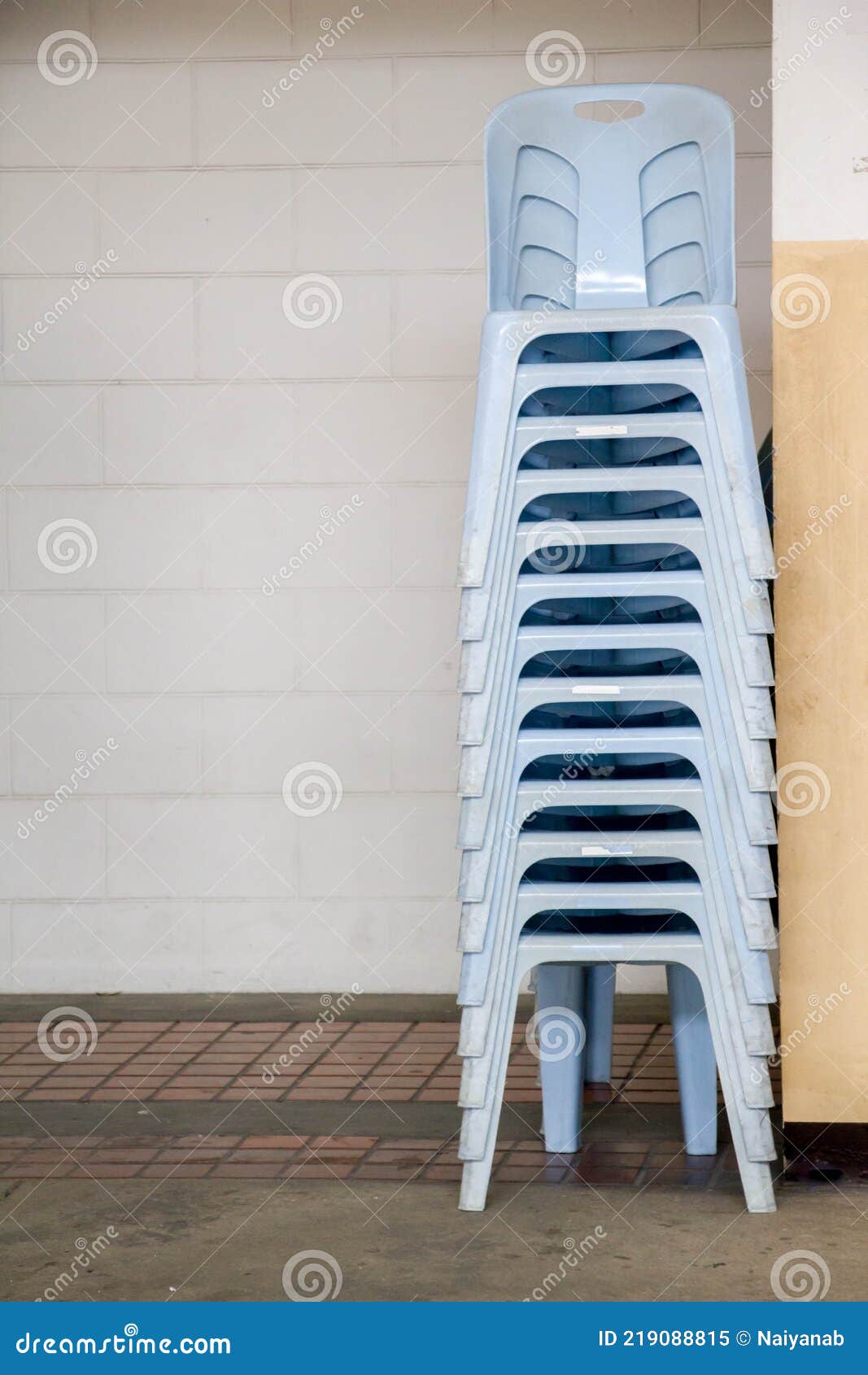 Blue plastic chair stock image. Image of background - 219088815