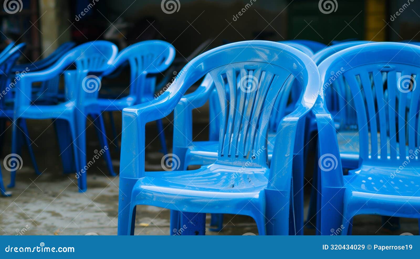 Blue plastic chairs stock image. Image of presentation - 320434029