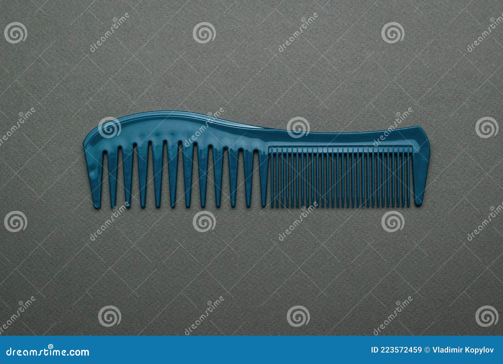 Blue Plastic Comb for Combing Hair on a Dark Gray Background. Flat Lay ...