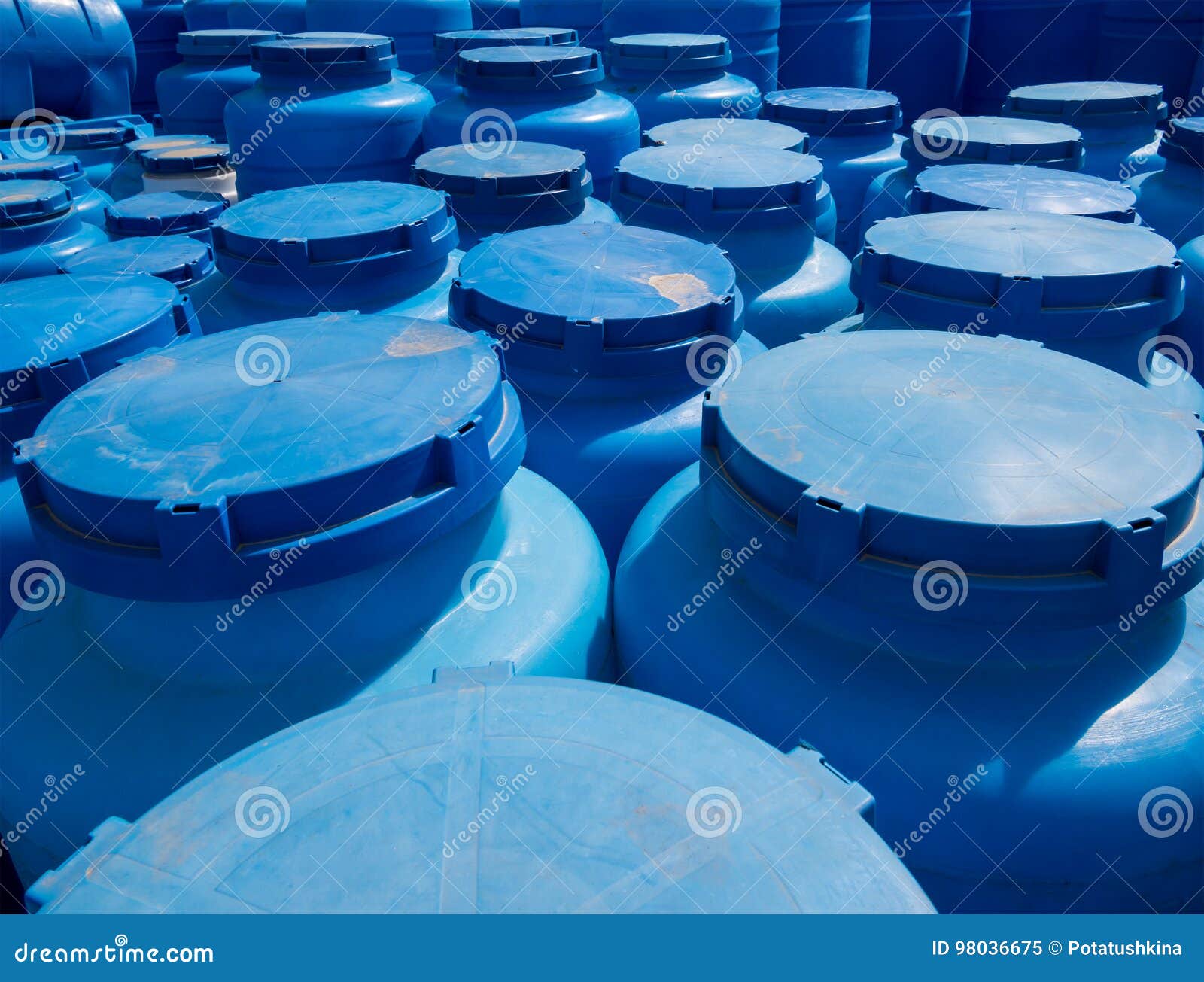 Blue Plastic Containers for Storage of Liquids in the Storage Area ...