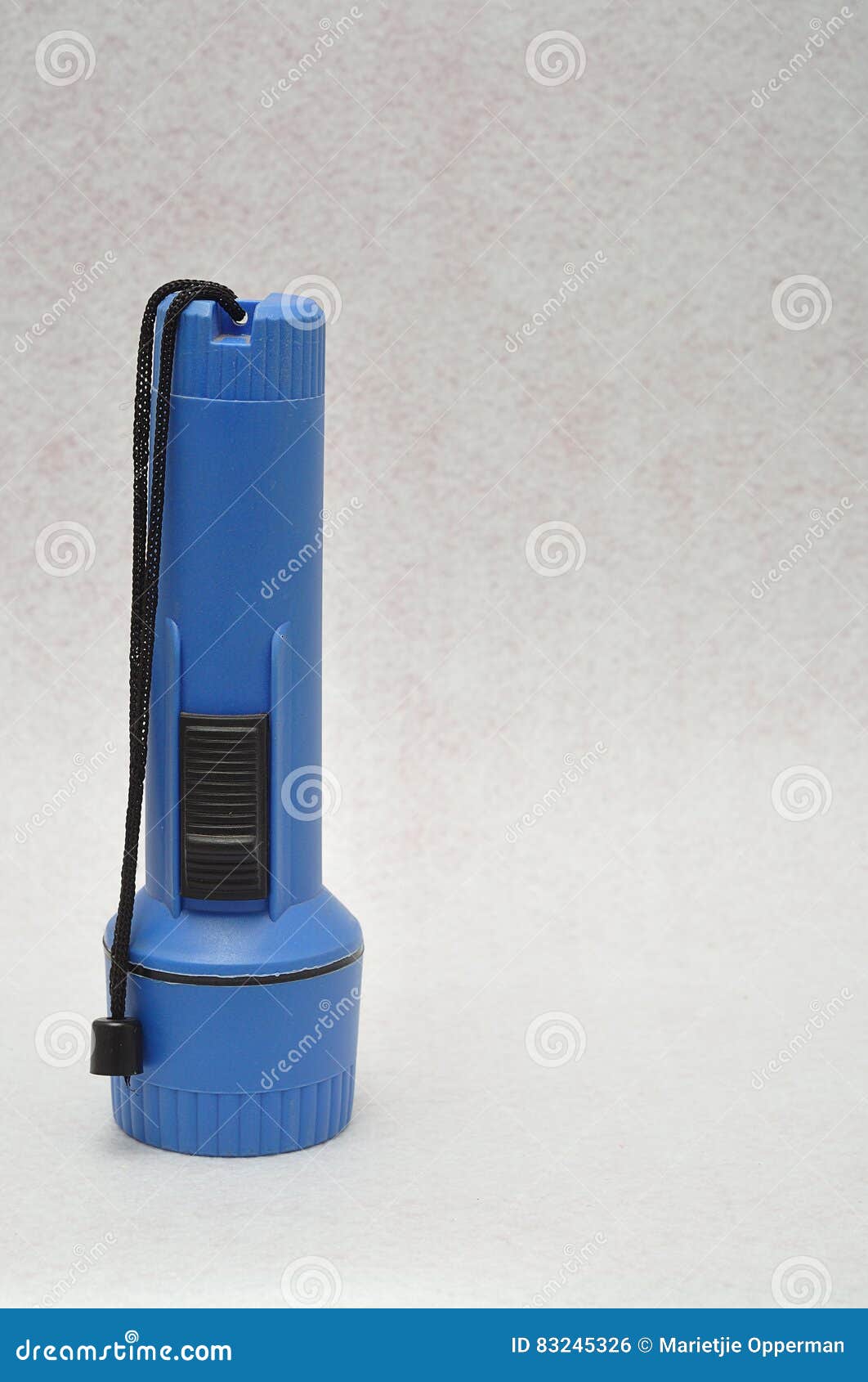 A blue plastic flashlight stock photo. Image of glass - 83245326