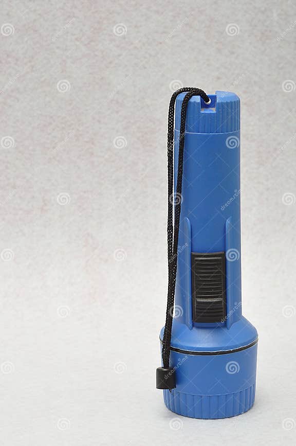 A blue plastic flashlight stock photo. Image of flash - 83267958