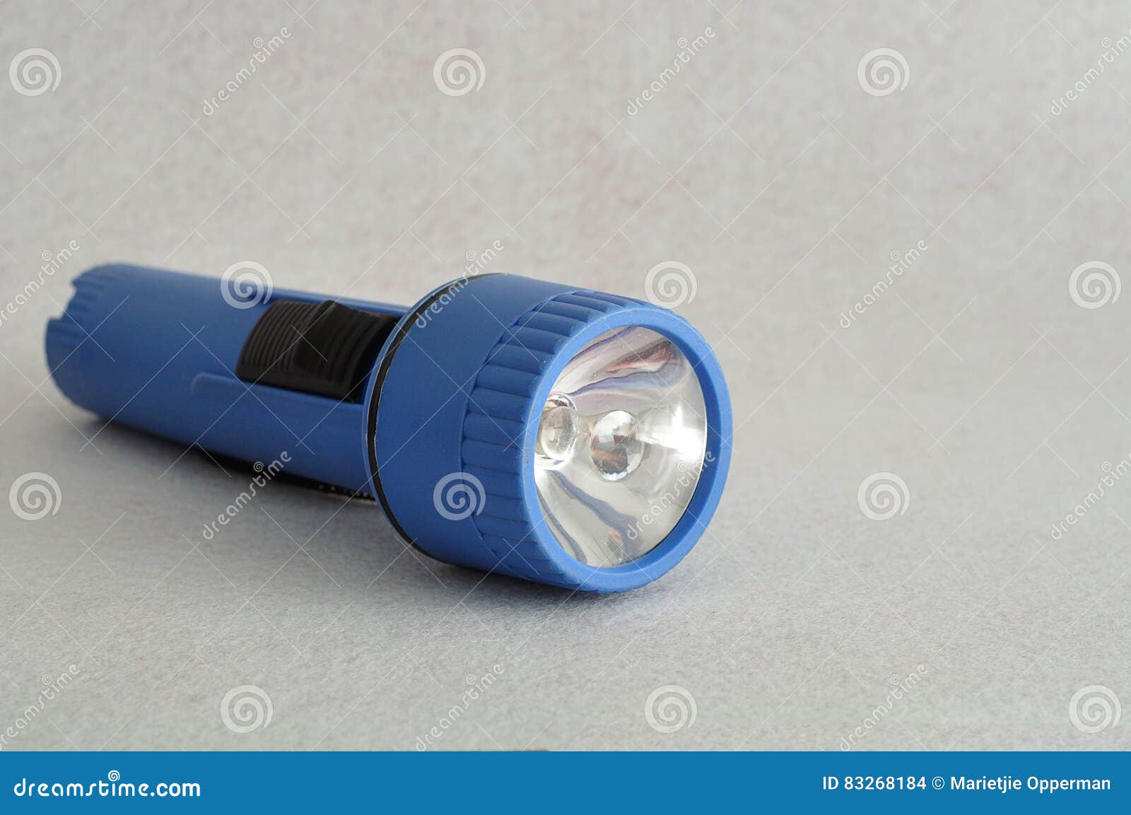 A blue plastic flashlight stock photo. Image of tool - 83268184