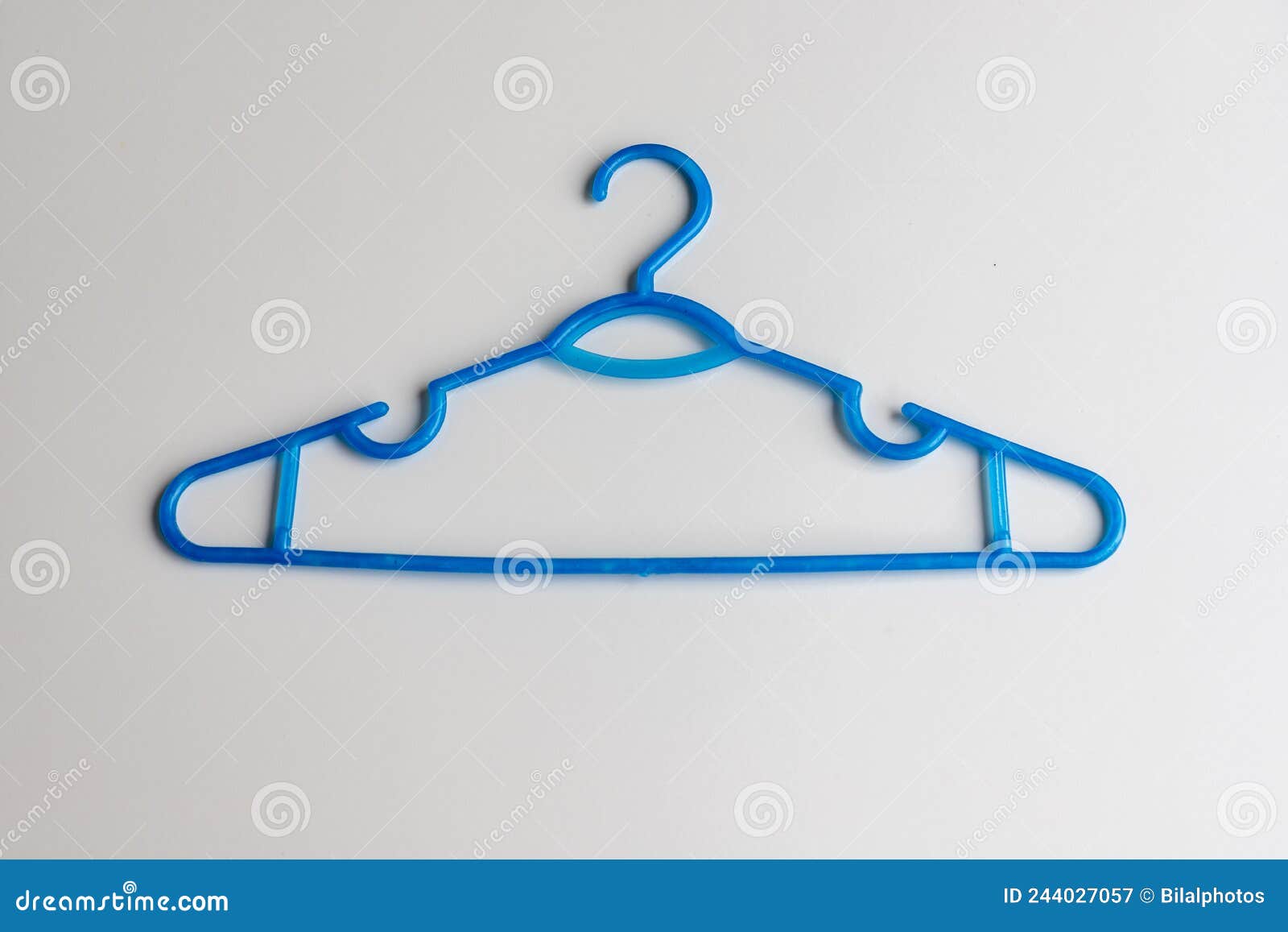 Blue Plastic Hanger on White Background Stock Image - Image of rack ...