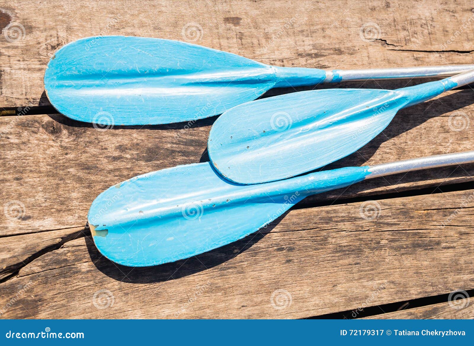 Blue Plastic Kayak Paddle on Wooden Background Stock Image - Image of ...
