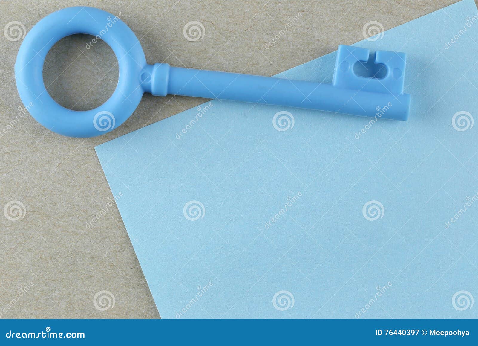 Blue Plastic Key is Placed on Blue Paper Note. Stock Image - Image of ...
