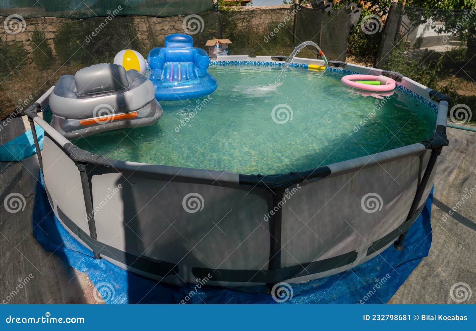Blue Plastic Pool in the Garden Stock Image - Image of beautiful, home ...