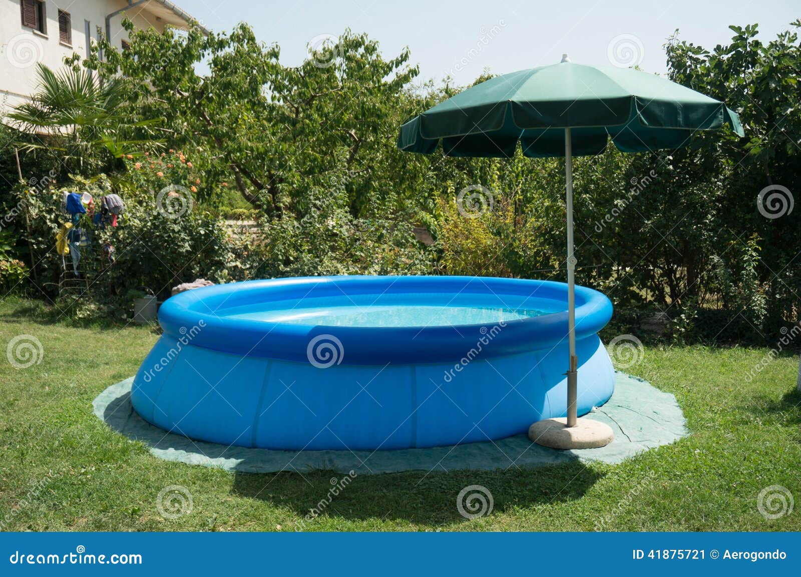 Blue plastic pool stock image. Image of rest, seasonal - 41875721