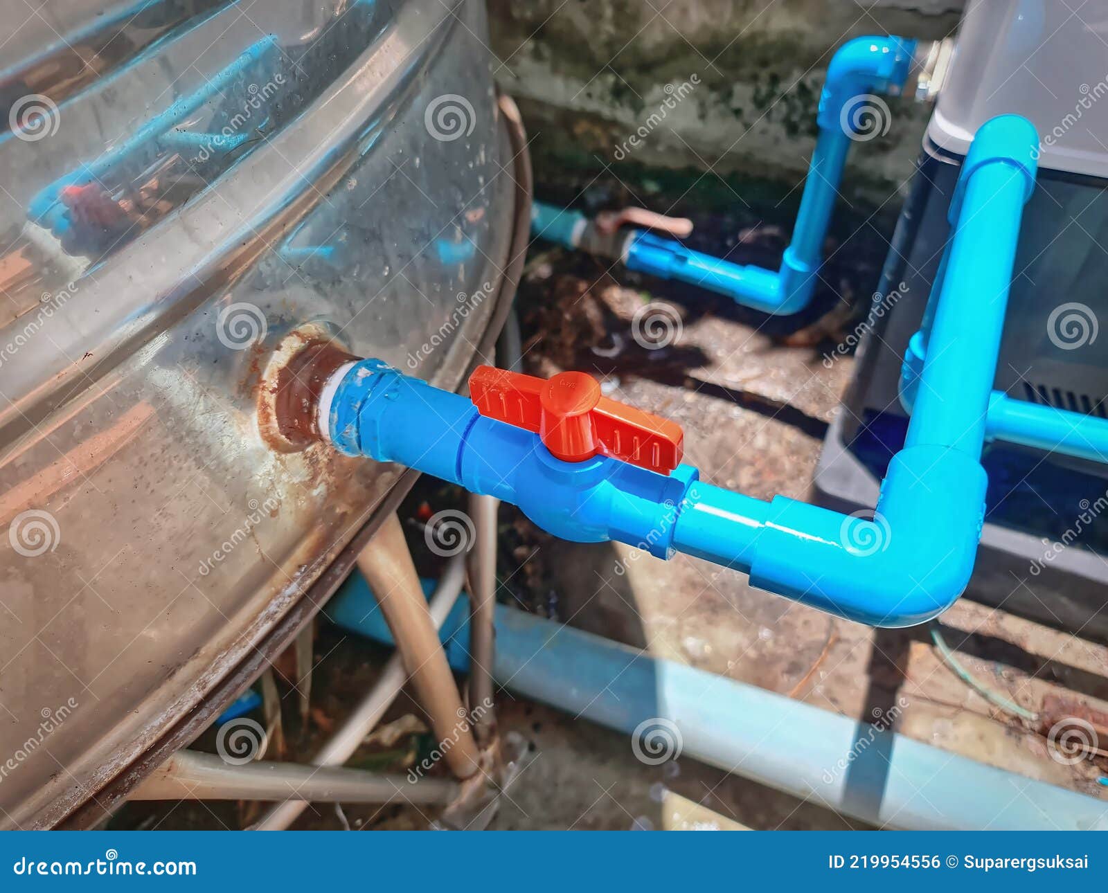 Blue Plastic PVC Ball Valve Connected To Rusty Water Tank Stock Photo ...