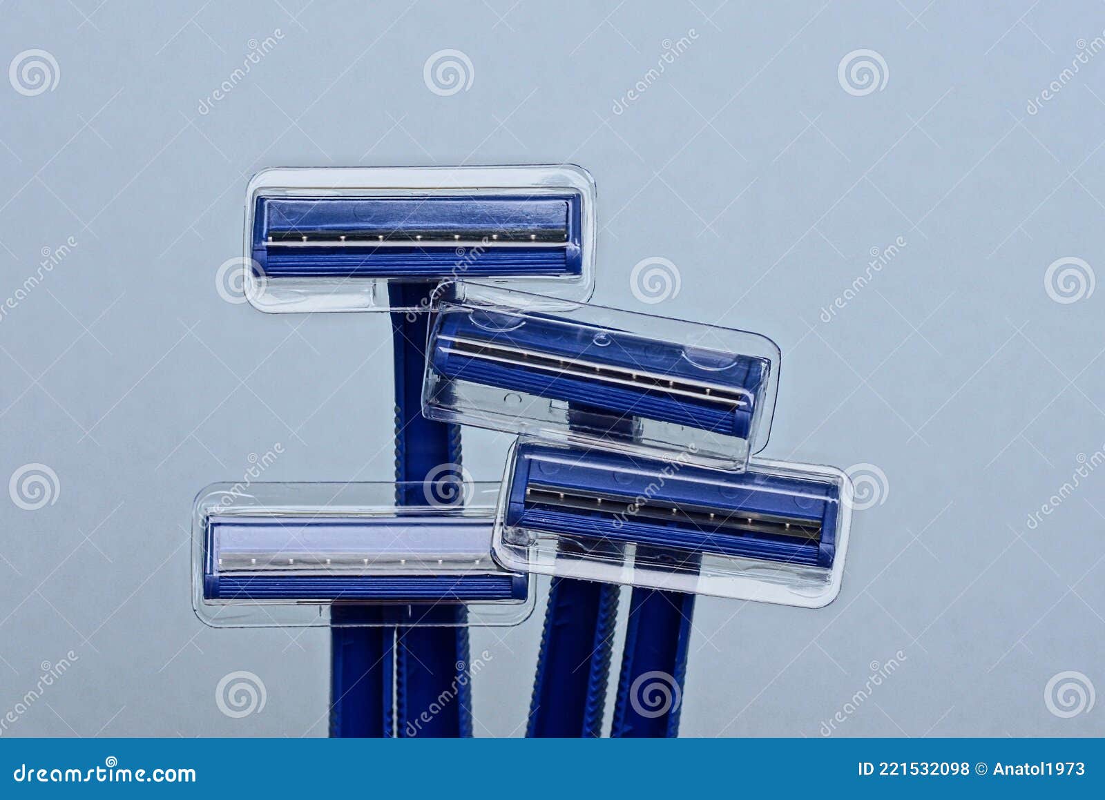 Blue Plastic Razors Lie on a Gray Background Stock Photo - Image of ...
