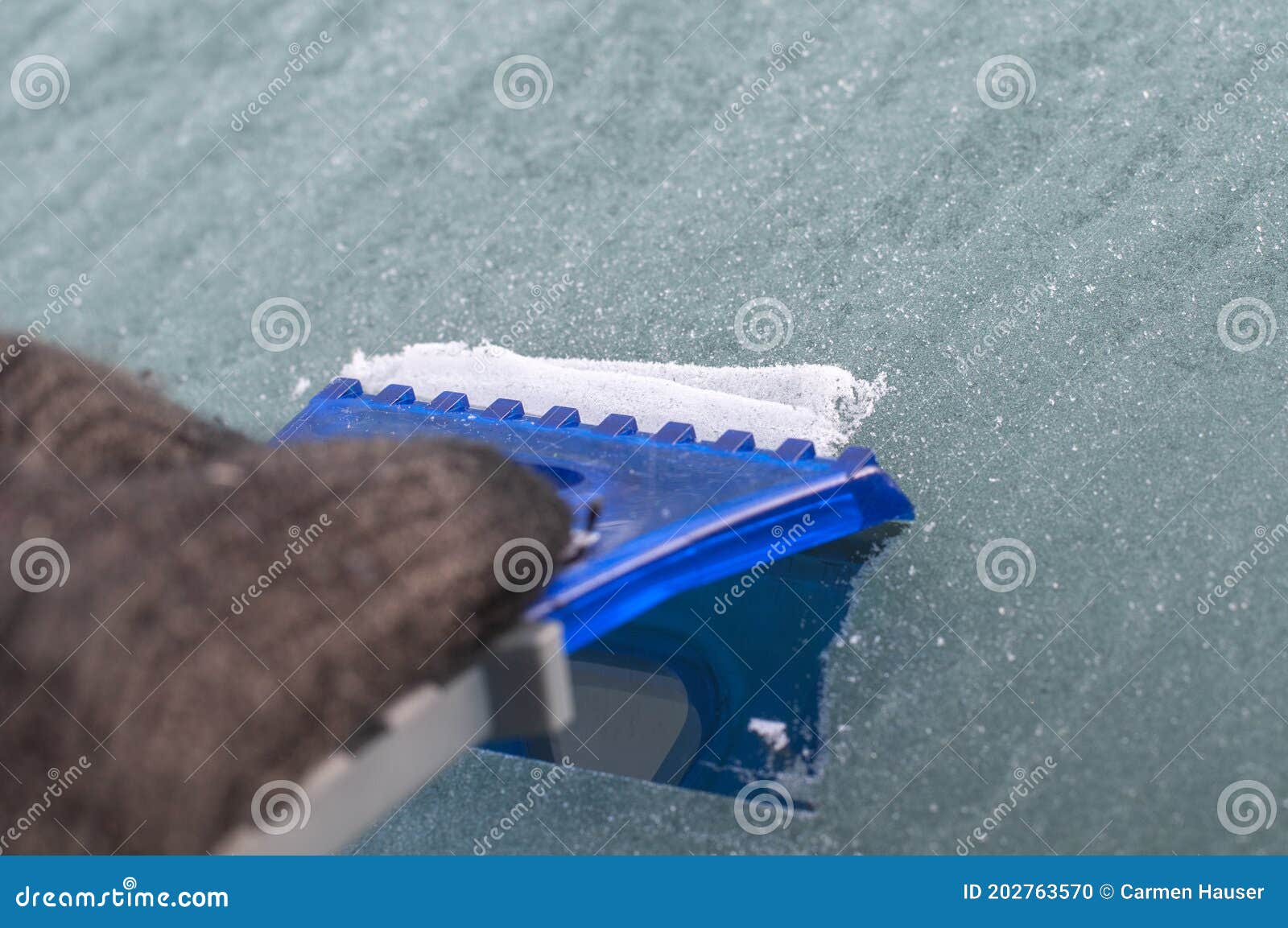 Scratching Ice from the Windscreen of a Car Stock Photo - Image of ...
