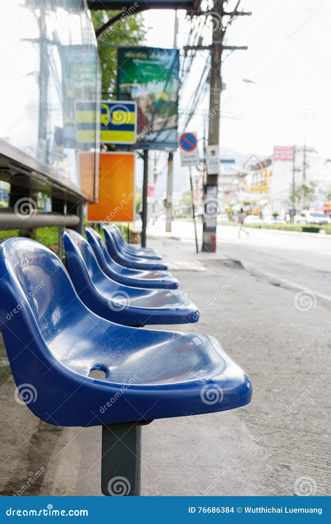 Blue Plastic Seats in Bus Stop, Soft Focus Stock Photo - Image of bench ...