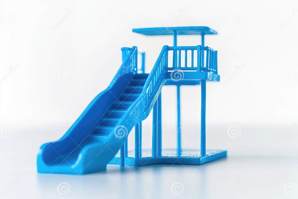 A Blue Plastic Slide on a White Surface, Ideal for Illustrations and ...