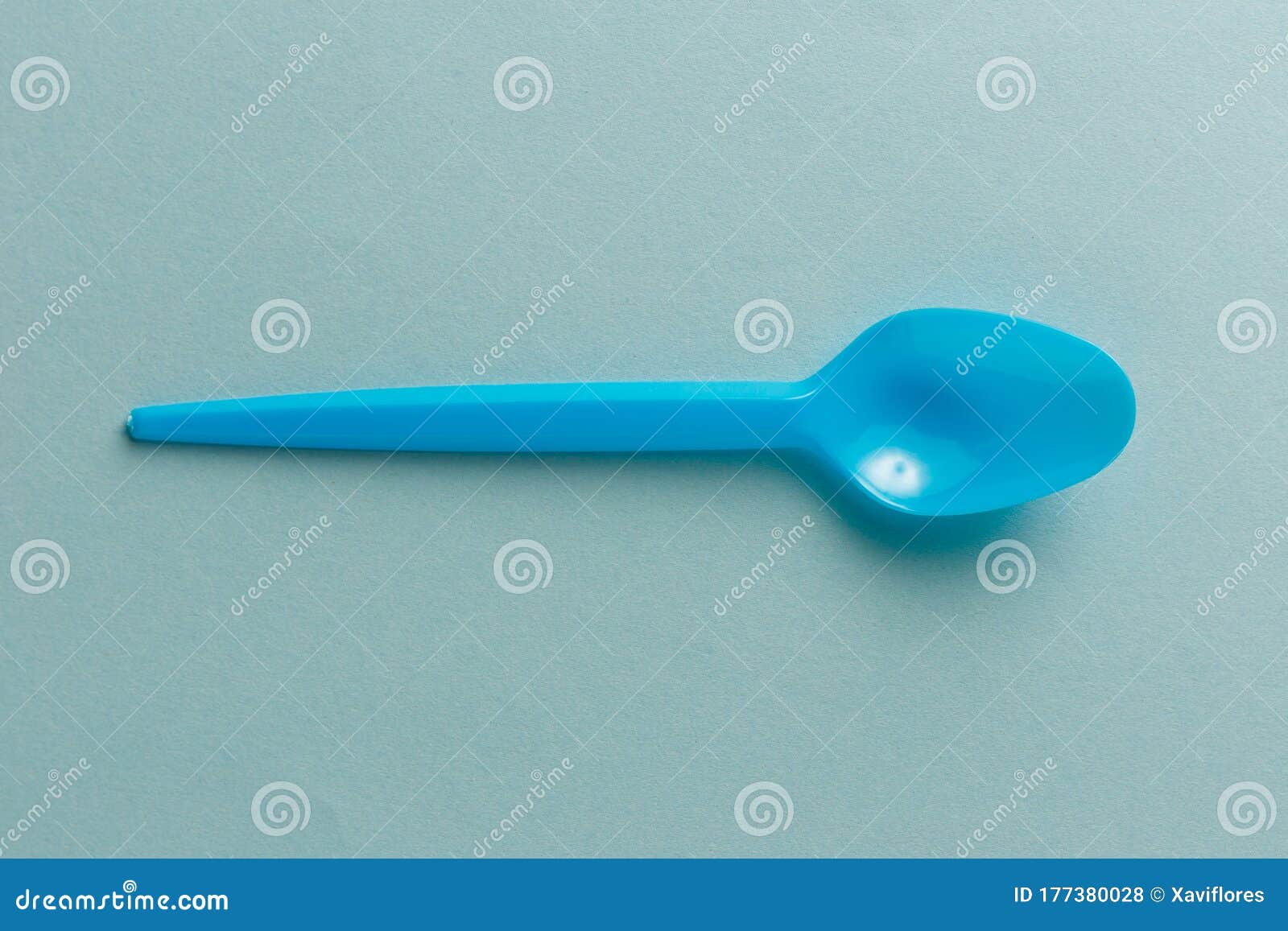Blue Plastic Spoon on a Blue Background Stock Photo - Image of stuff ...