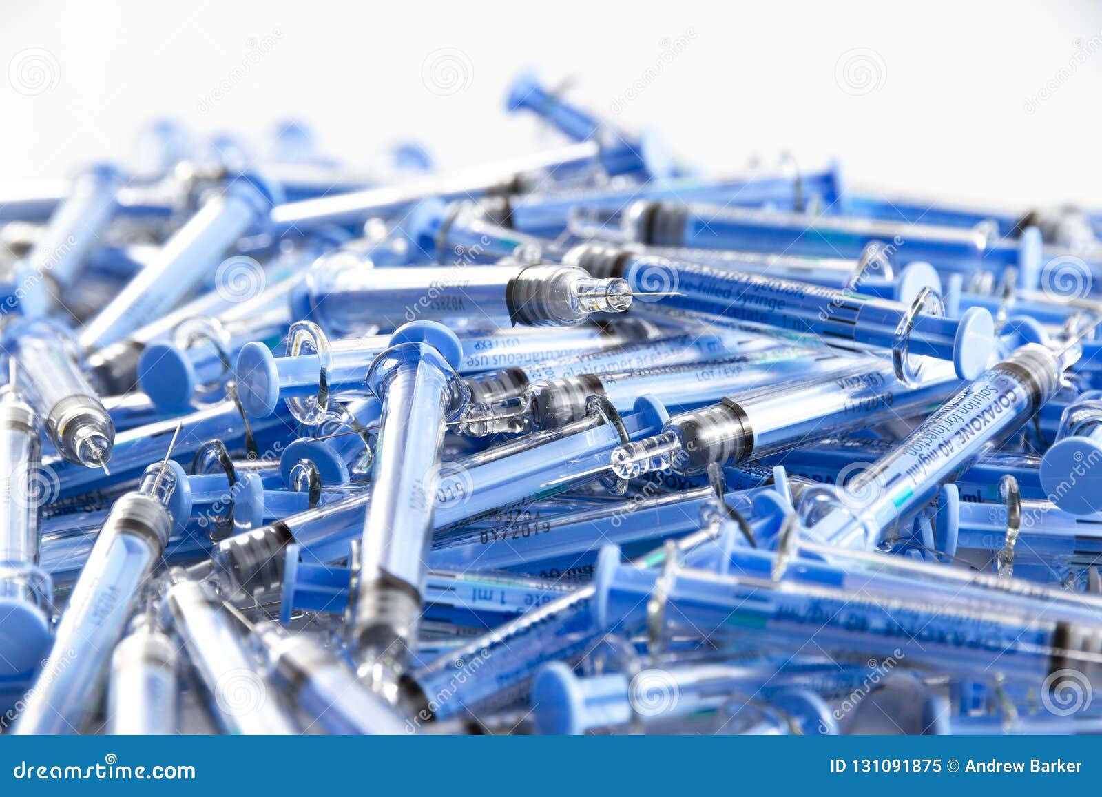 Blue plastic syringes editorial image. Image of syringe - 131091875