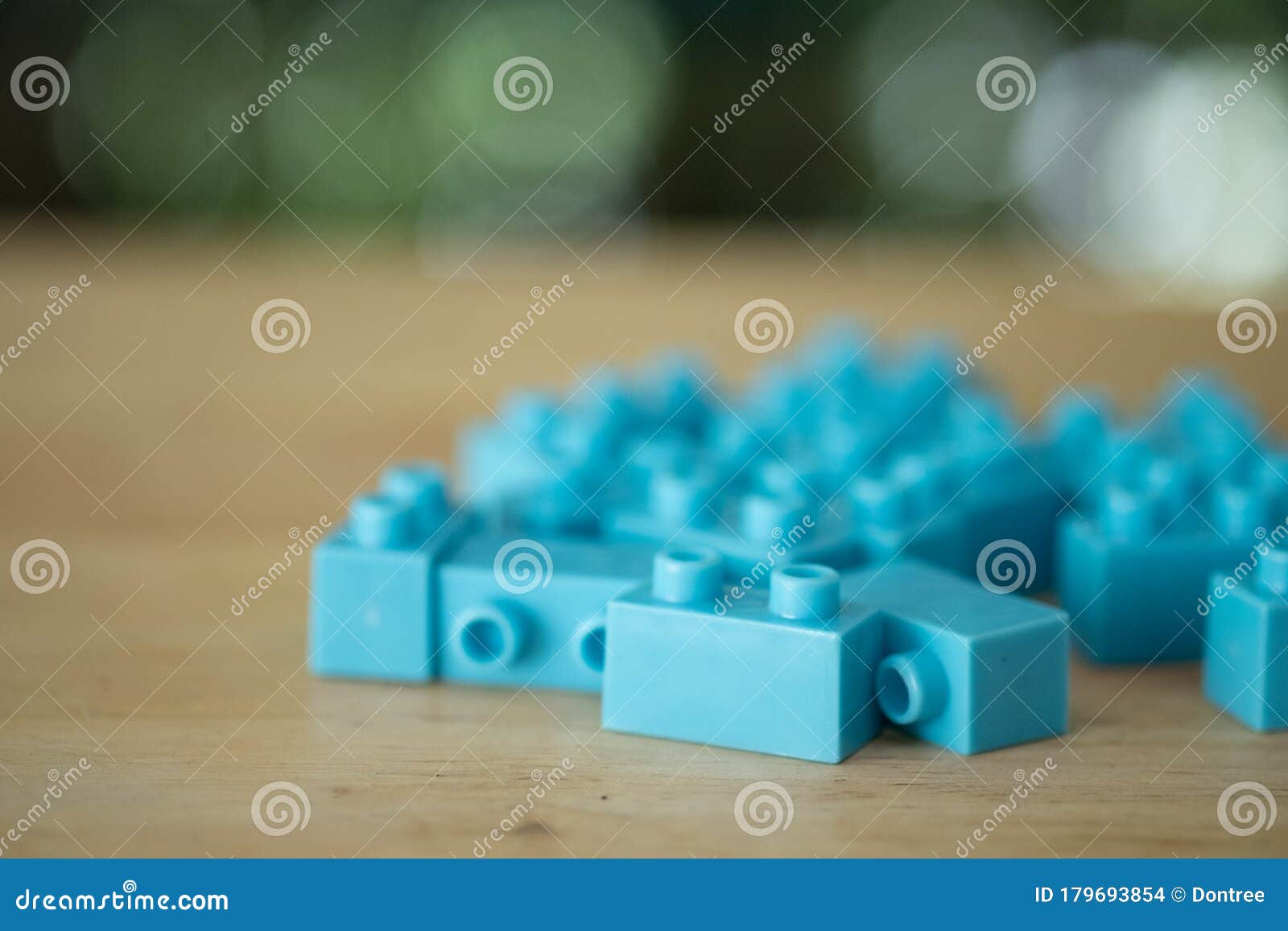 Blue of Plastic Toy Blocks on Wood Table Stock Photo - Image of group ...