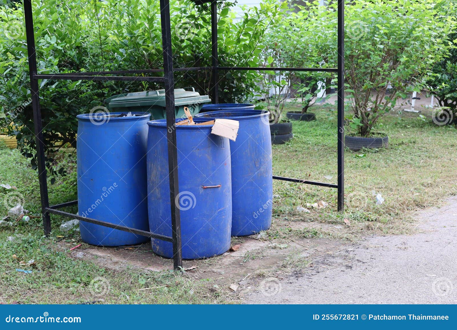 Blue plastic trash can stock image. Image of fence, playground - 255672821