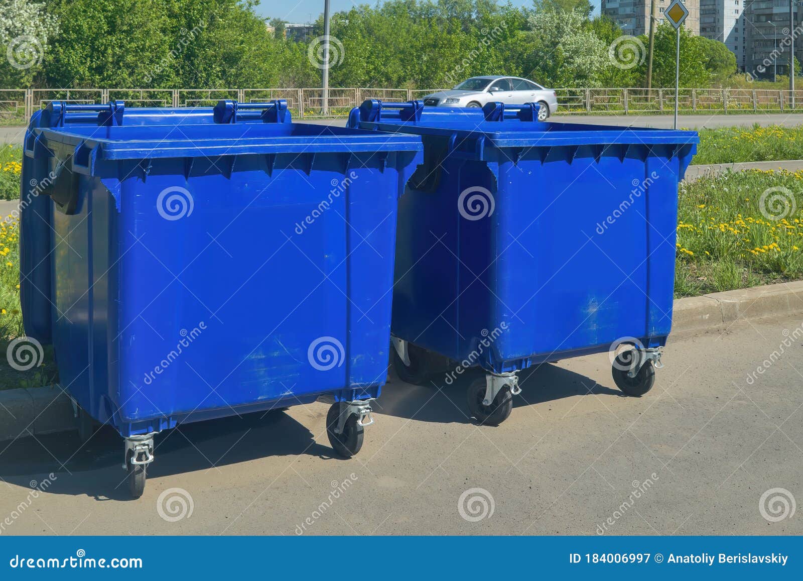Two Plastic Trash Recycling Containers. Blue Containers for Collecting ...