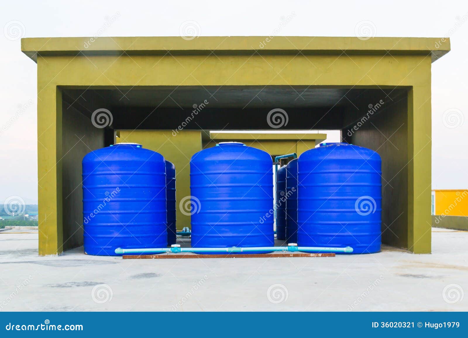Blue plastic water tank stock image. Image of grass, building - 36020321