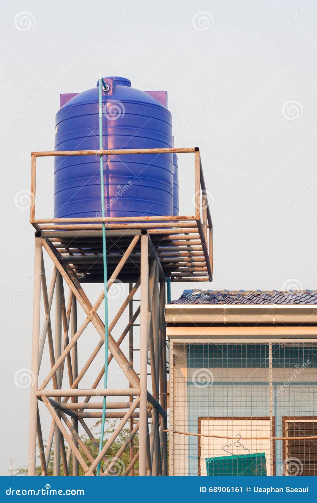 Blue Plastic Water Tank On The Tower. Stock Image | CartoonDealer.com ...