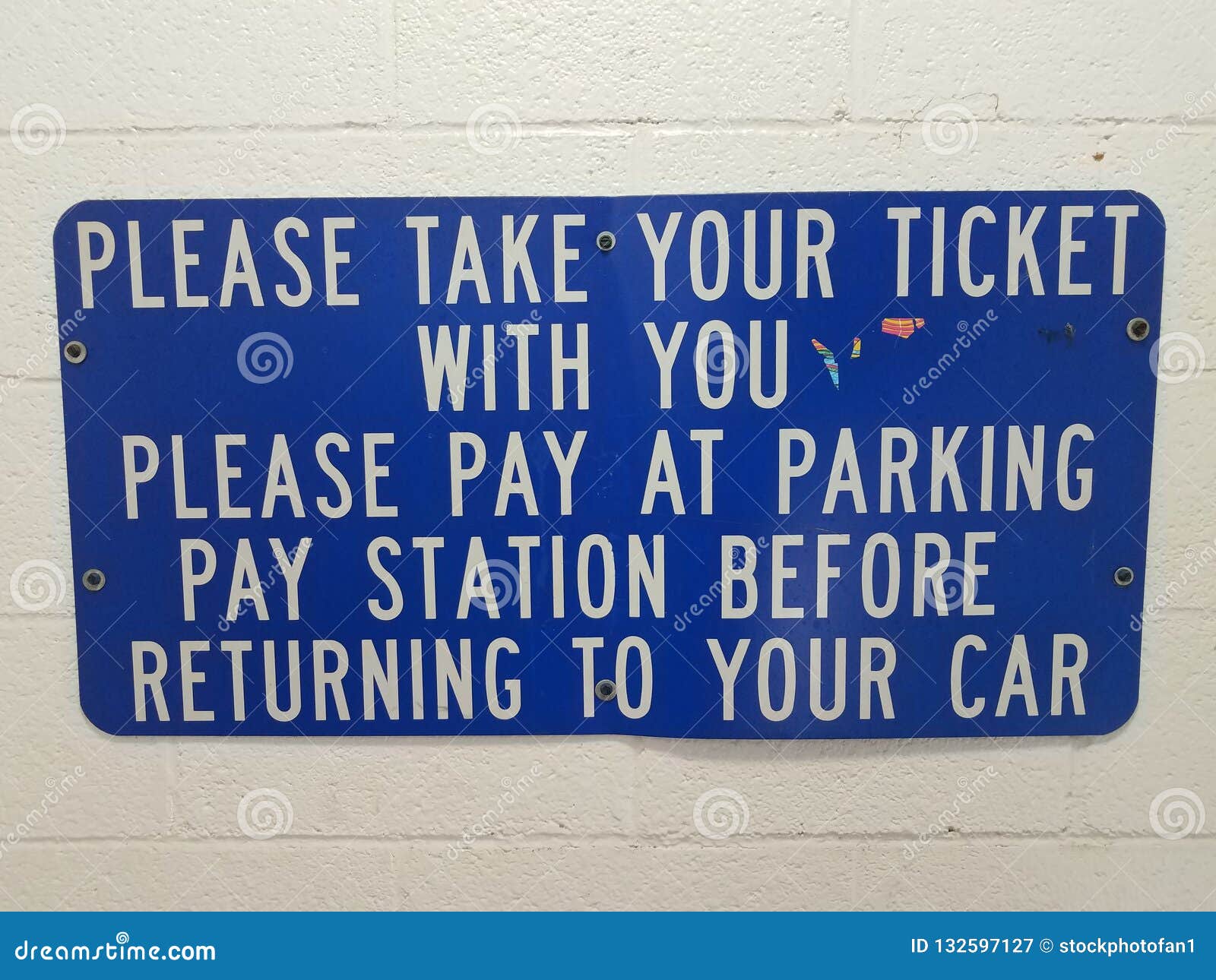 Blue Please Take Your Parking Ticket Sign on Wall Stock Image - Image ...