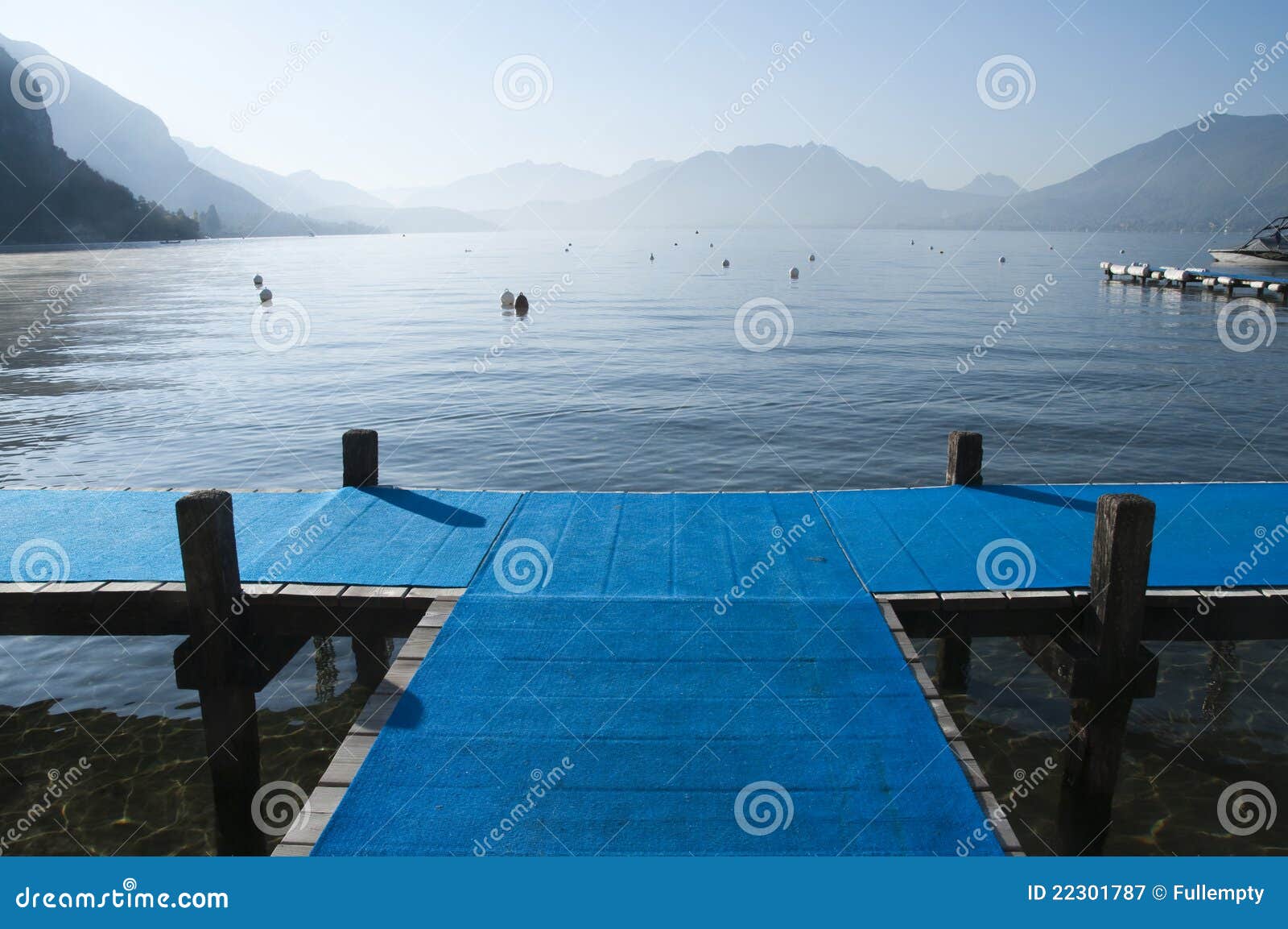 Blue Pontoon Cross on Lake Annecy Stock Image - Image of water, lake ...