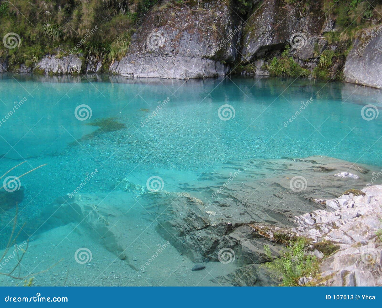 Blue Pool Surrounded by Rocks Stock Image - Image of outside, colors ...
