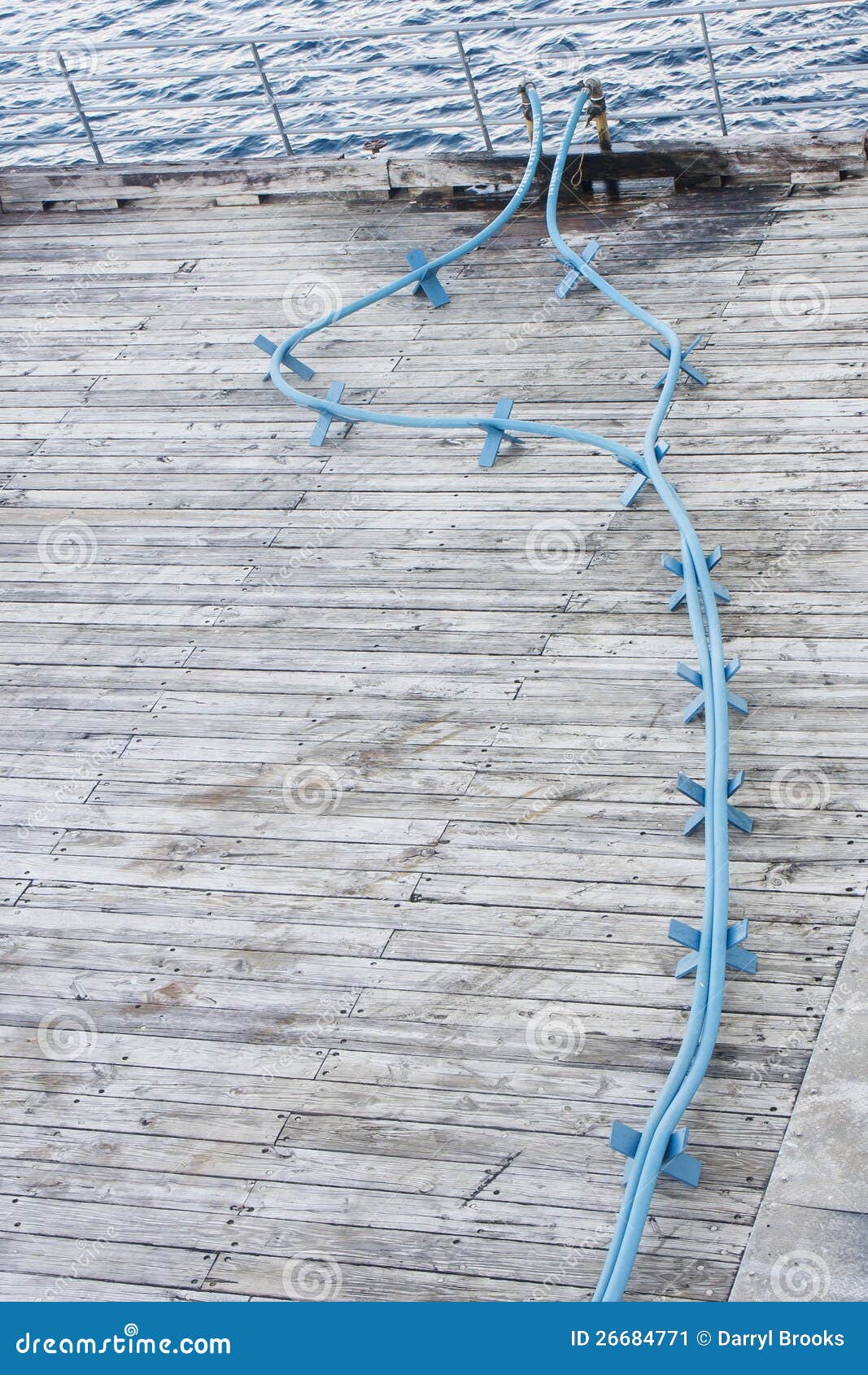 Blue Potable Water Hose Running Across Pier Stock Image - Image of ...