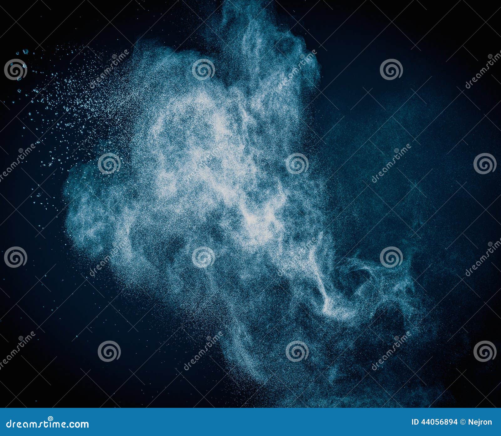 Blue powder exploding stock photo. Image of beginning - 44056894